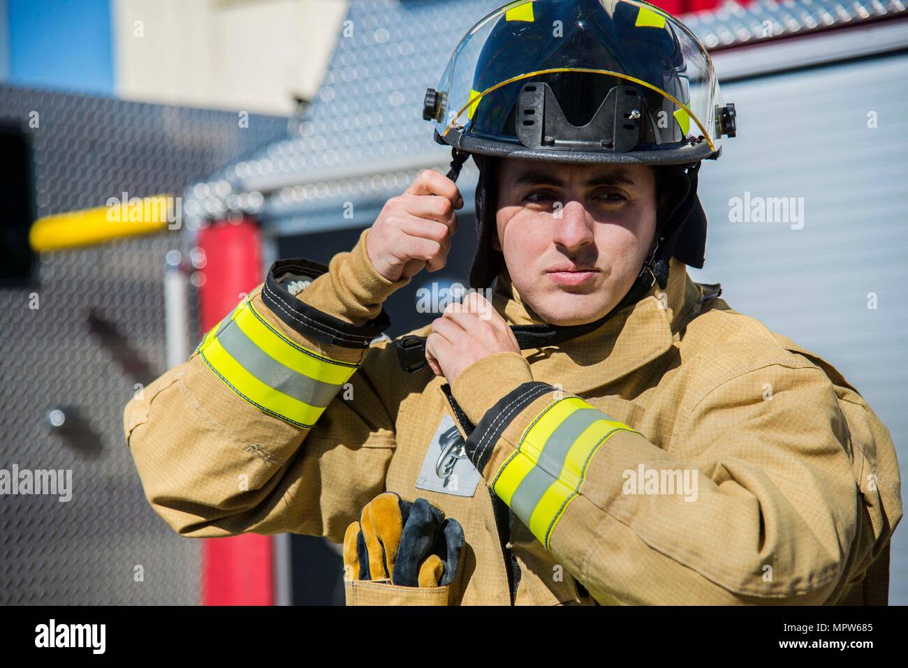 Firefighters with the 375th Civil Engineer Squadron perform drills in ...