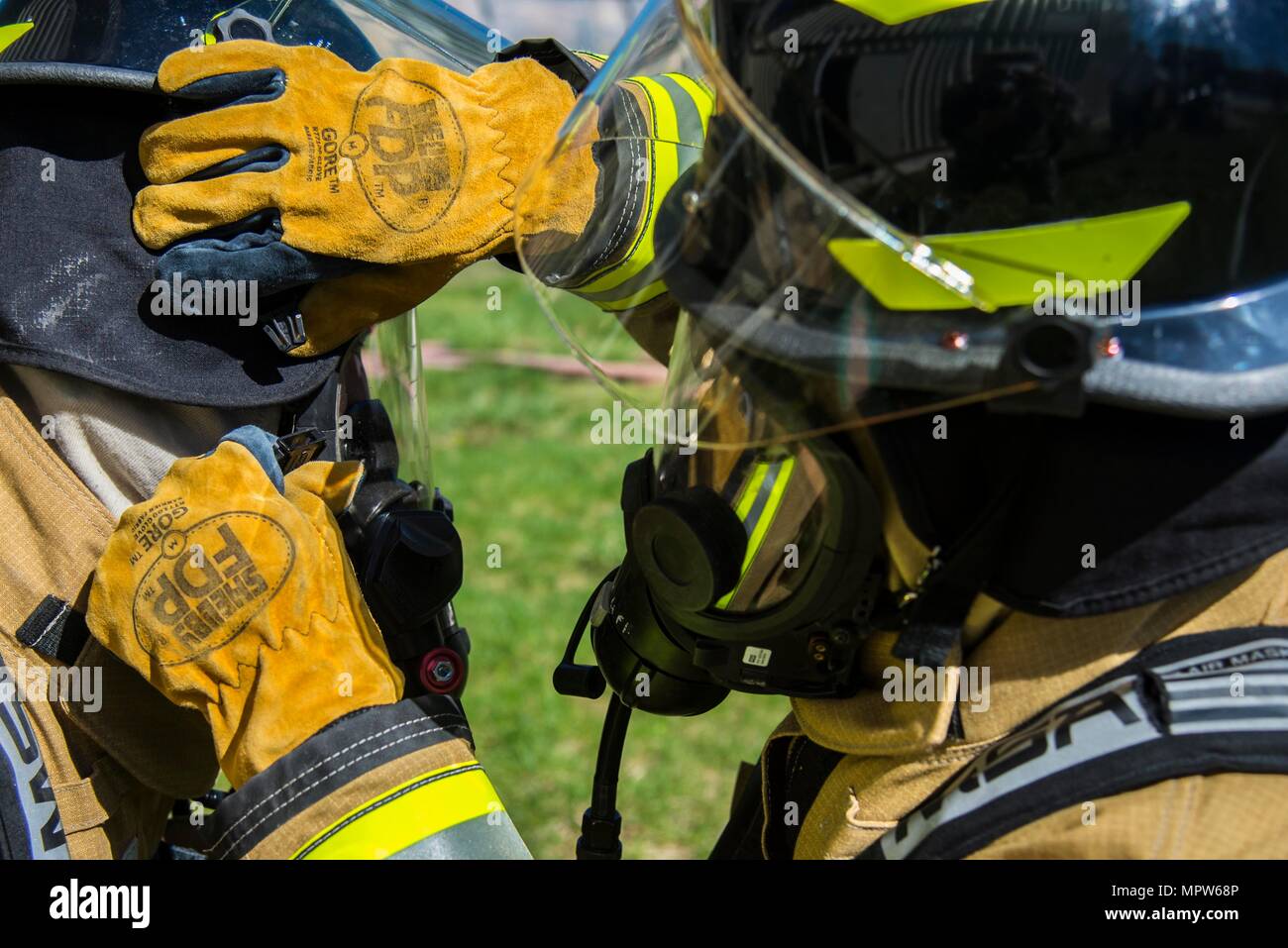 Firefighters with the 375th Civil Engineer Squadron perform drills in ...