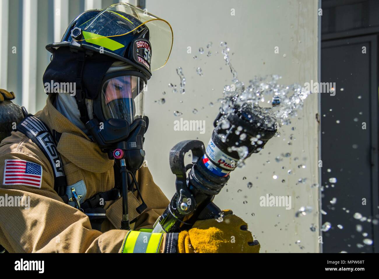 Firefighters with the 375th Civil Engineer Squadron perform drills in ...