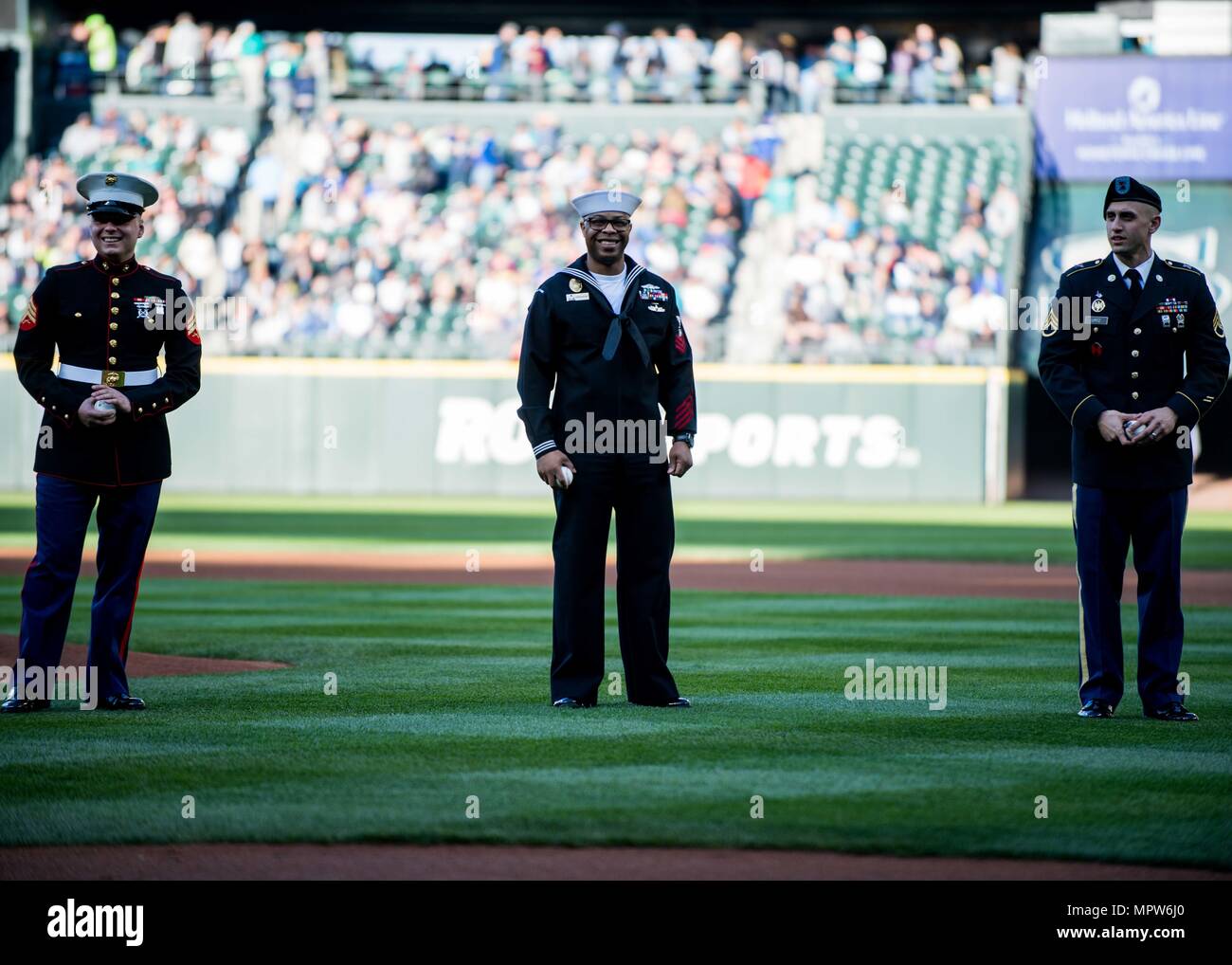 170415-N-WX604-124 records service members throwing the ceremonial ...