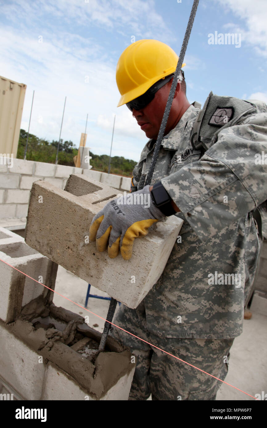 U.S. Army Staff Sgt. Alfred Washington, with the 808th Engineer Company ...
