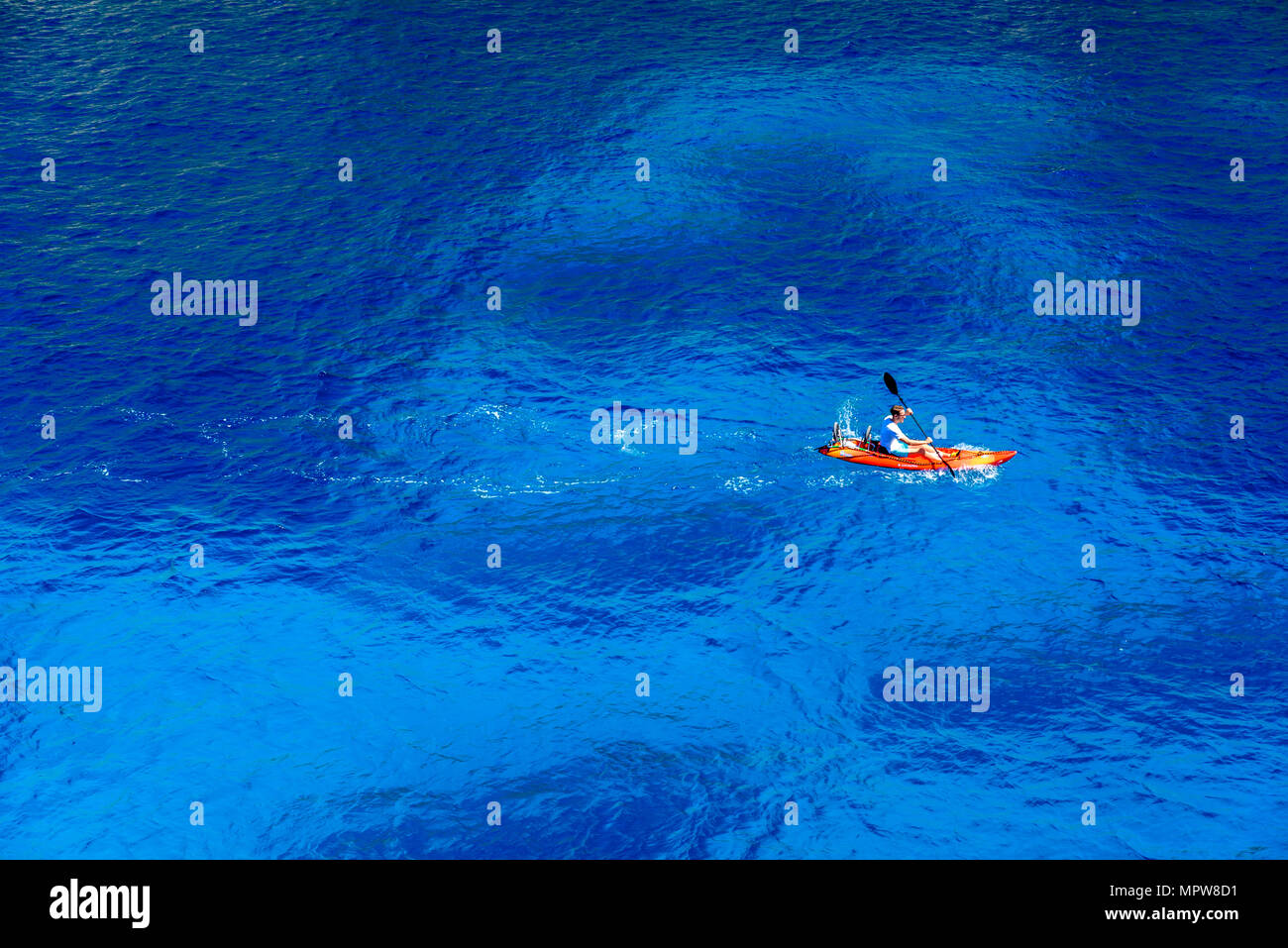 Kayaking in beautiful bay Stock Photo - Alamy