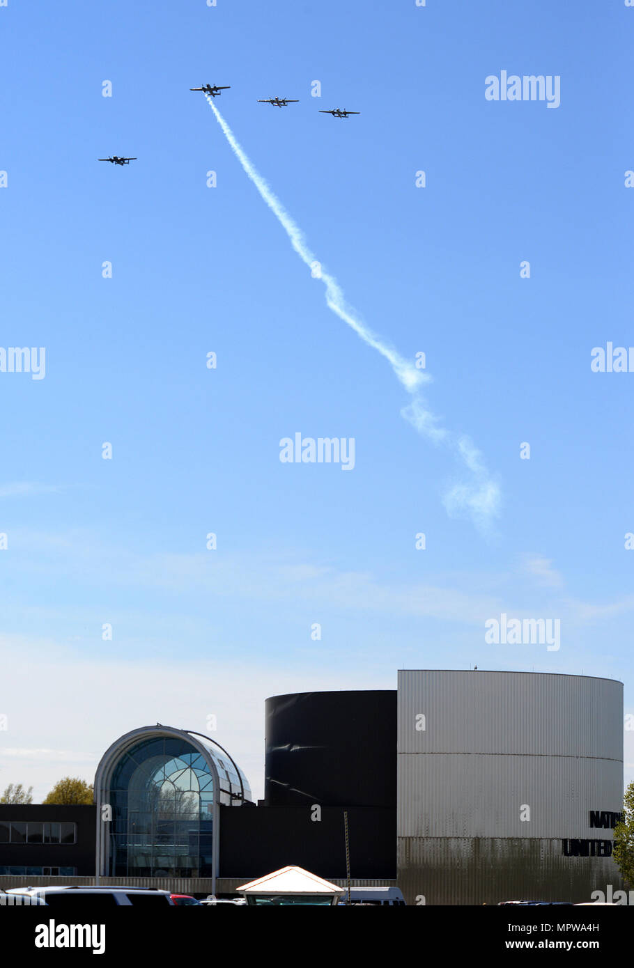 Four B-25 Mitchell bombers fly over the National Museum of the United ...