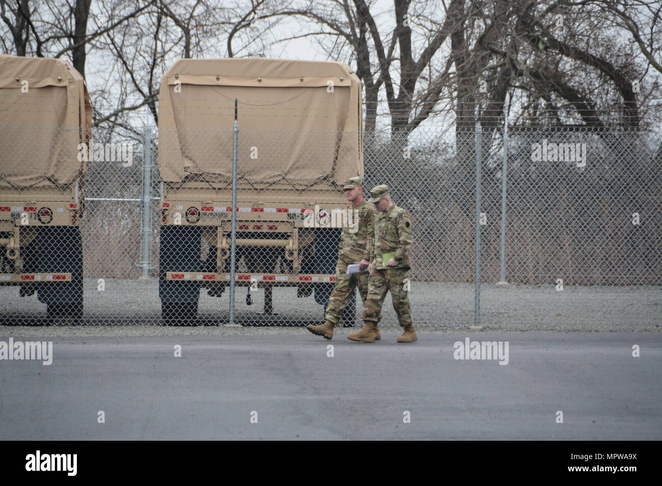 Maj. Joseph Martinkis and Capt. Eric Knight, Soldiers with the ...