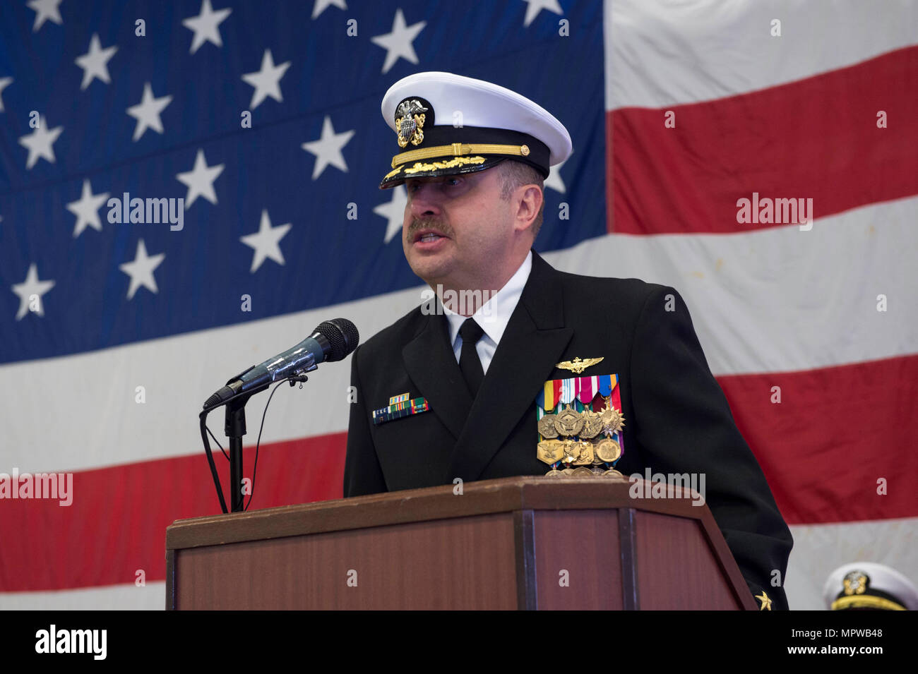 170420-N-RU971-343 SASEBO, Japan (April 20, 2017) Capt. Larry McCullen ...