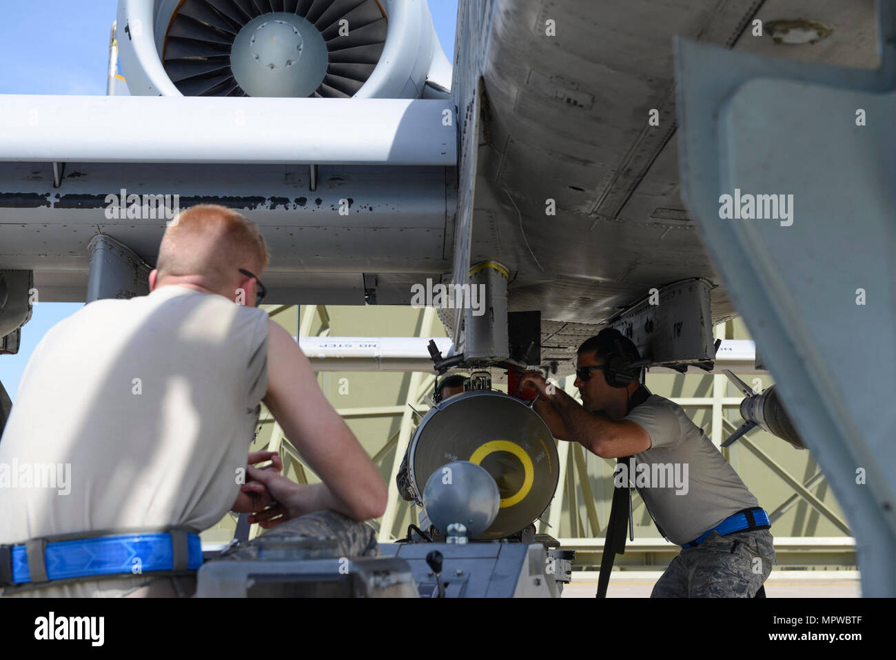 U.S. Air Force Senior Airman Michael Sherwood (left), 447th ...