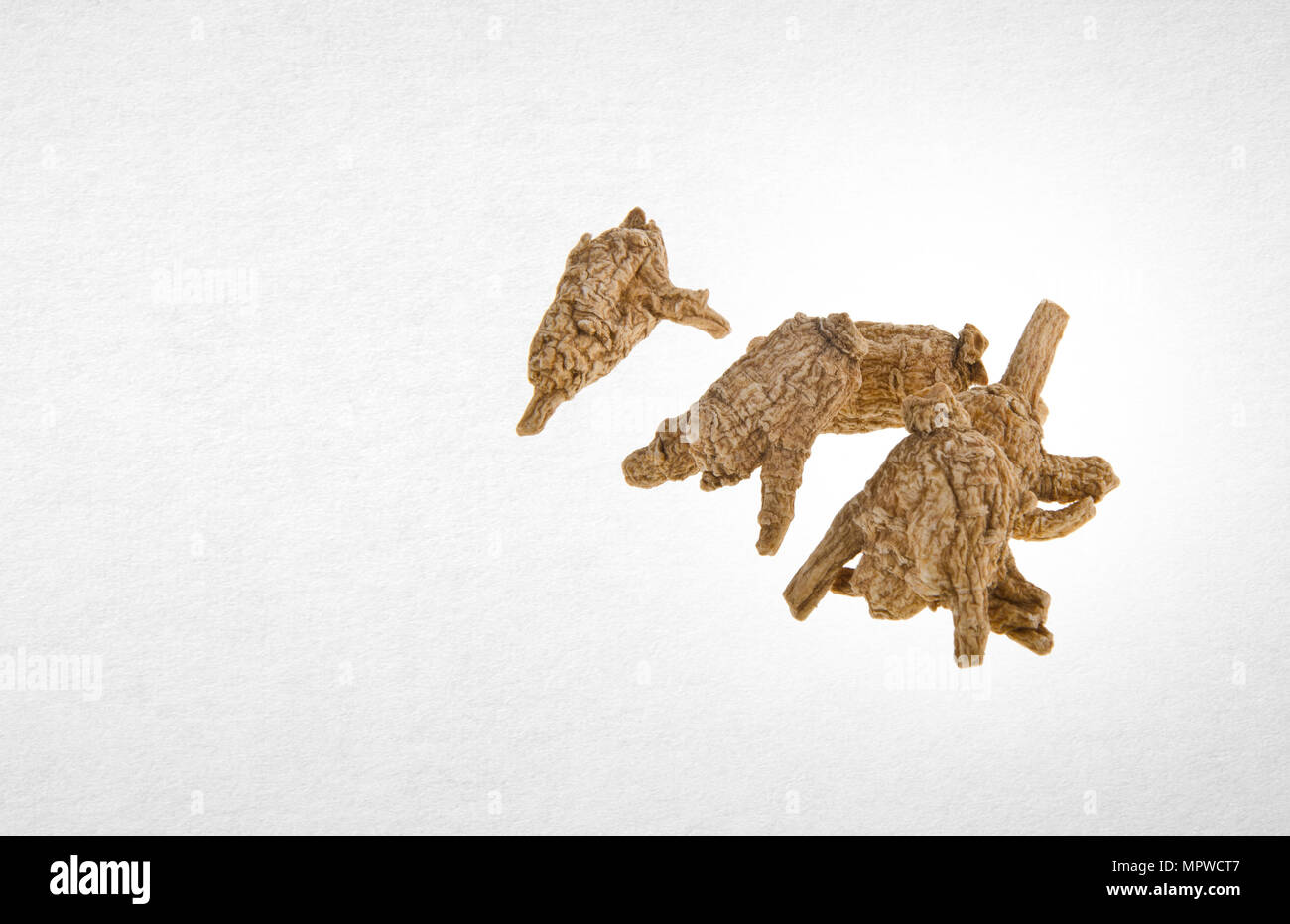 Ginseng or Dried Ginseng on a background Stock Photo - Alamy