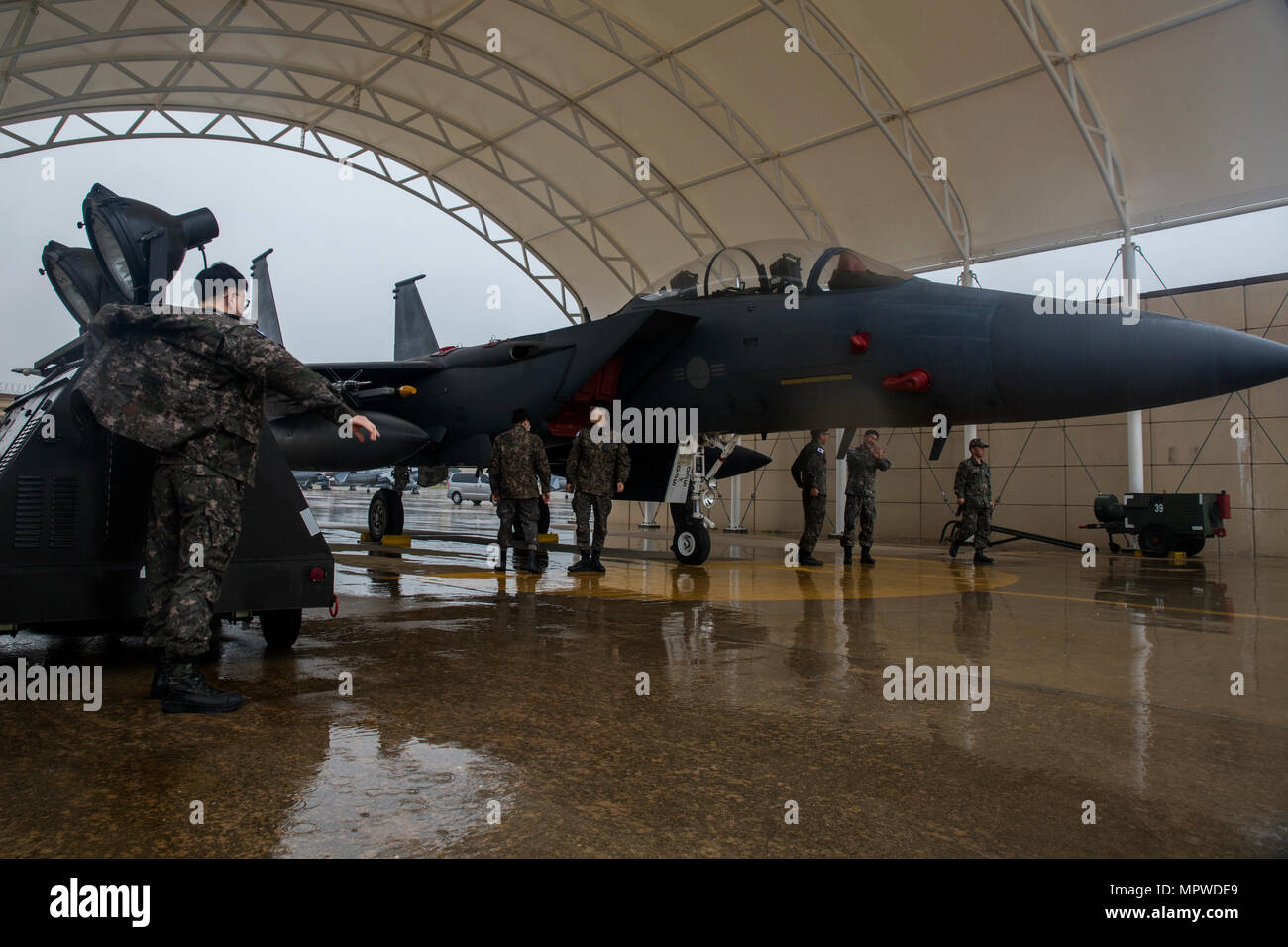 Republic of Korea Air Force personnel perform maintenance on an F-15K ...