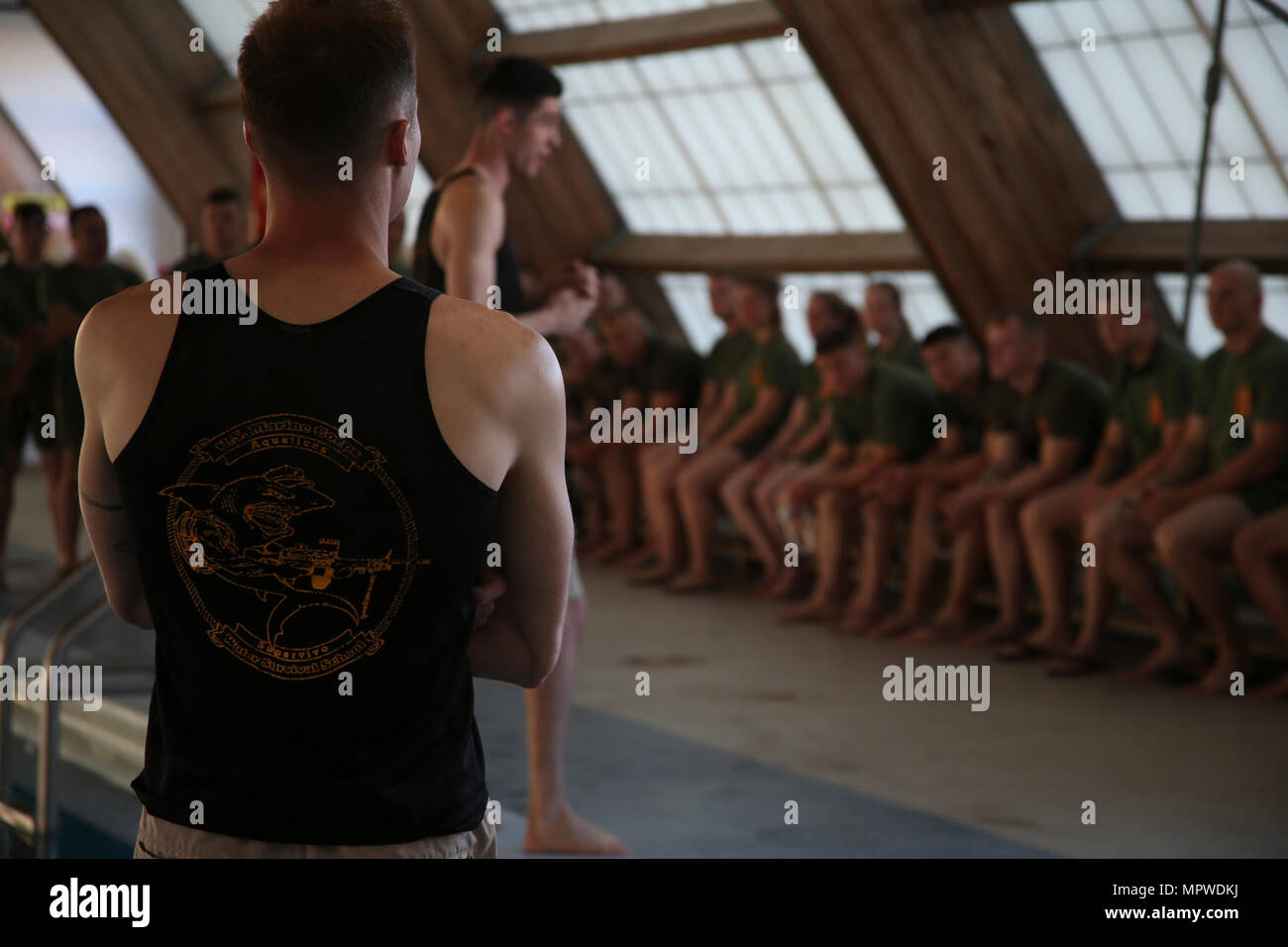 U.S. Marine Corps Staff Sgt. Daniel Coleman, left, Staff Non ...