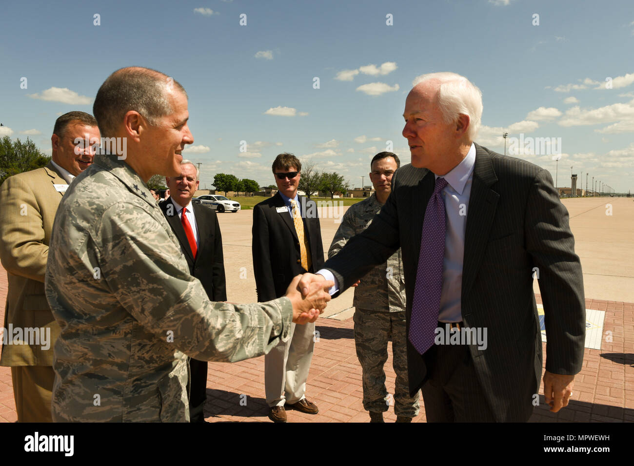 U.S. Sen. John Cornyn, R-TX, shakes hands with Maj. Gen. Thomas ...