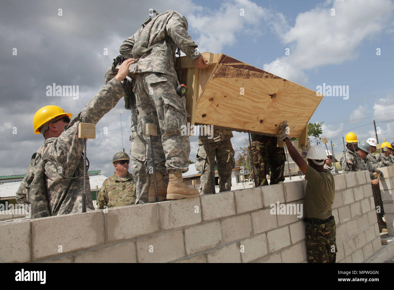 Soldiers with the 808th Engineer Company and Belize Defense Force place ...
