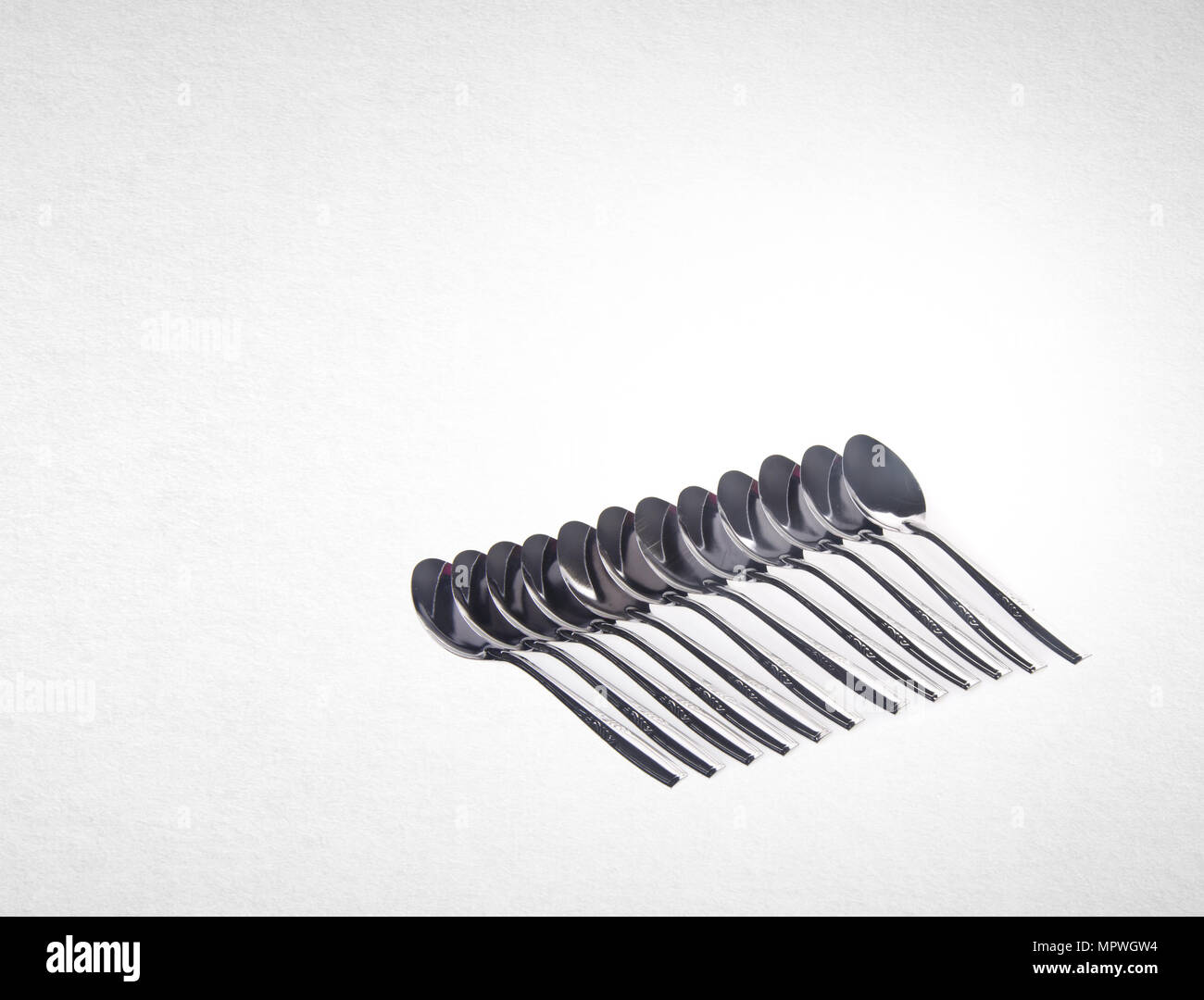 Spoon or Steel metal spoon on a background Stock Photo - Alamy