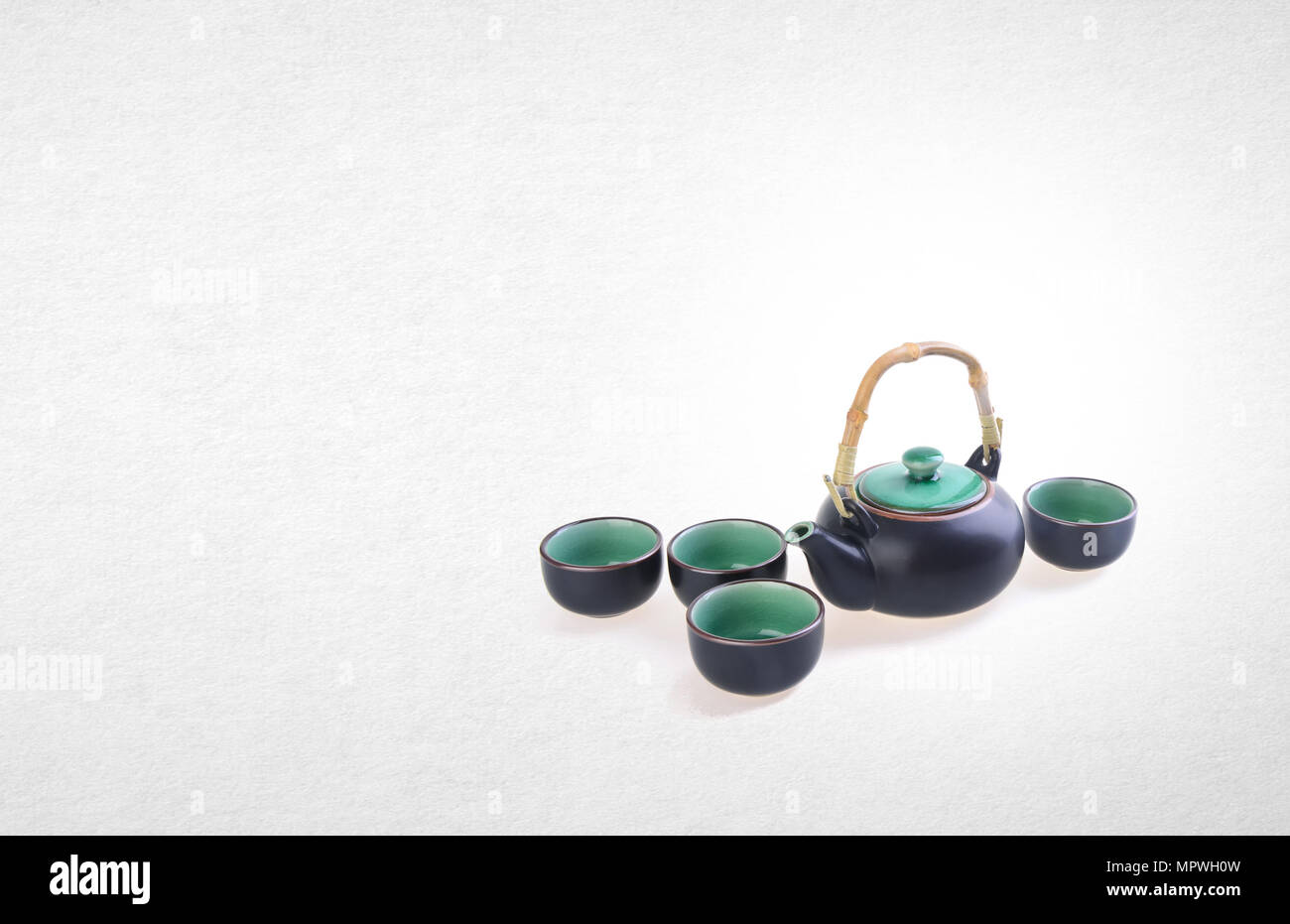 Chinese tea set with cups and tea pot on background Stock Photo - Alamy