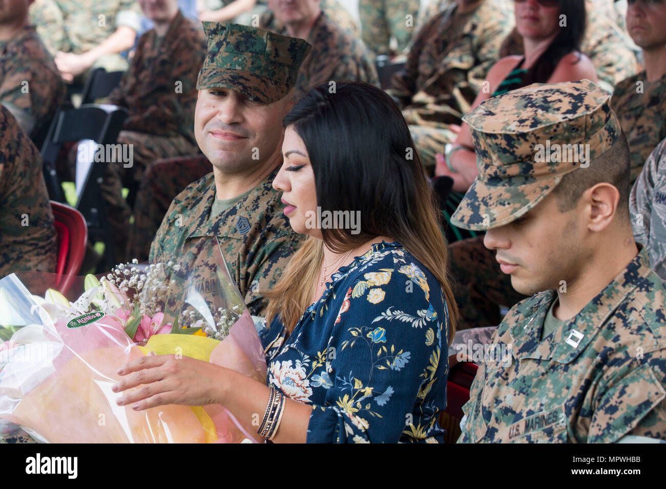 U.S. Marines and families with the 3D Marine Division attend a ...