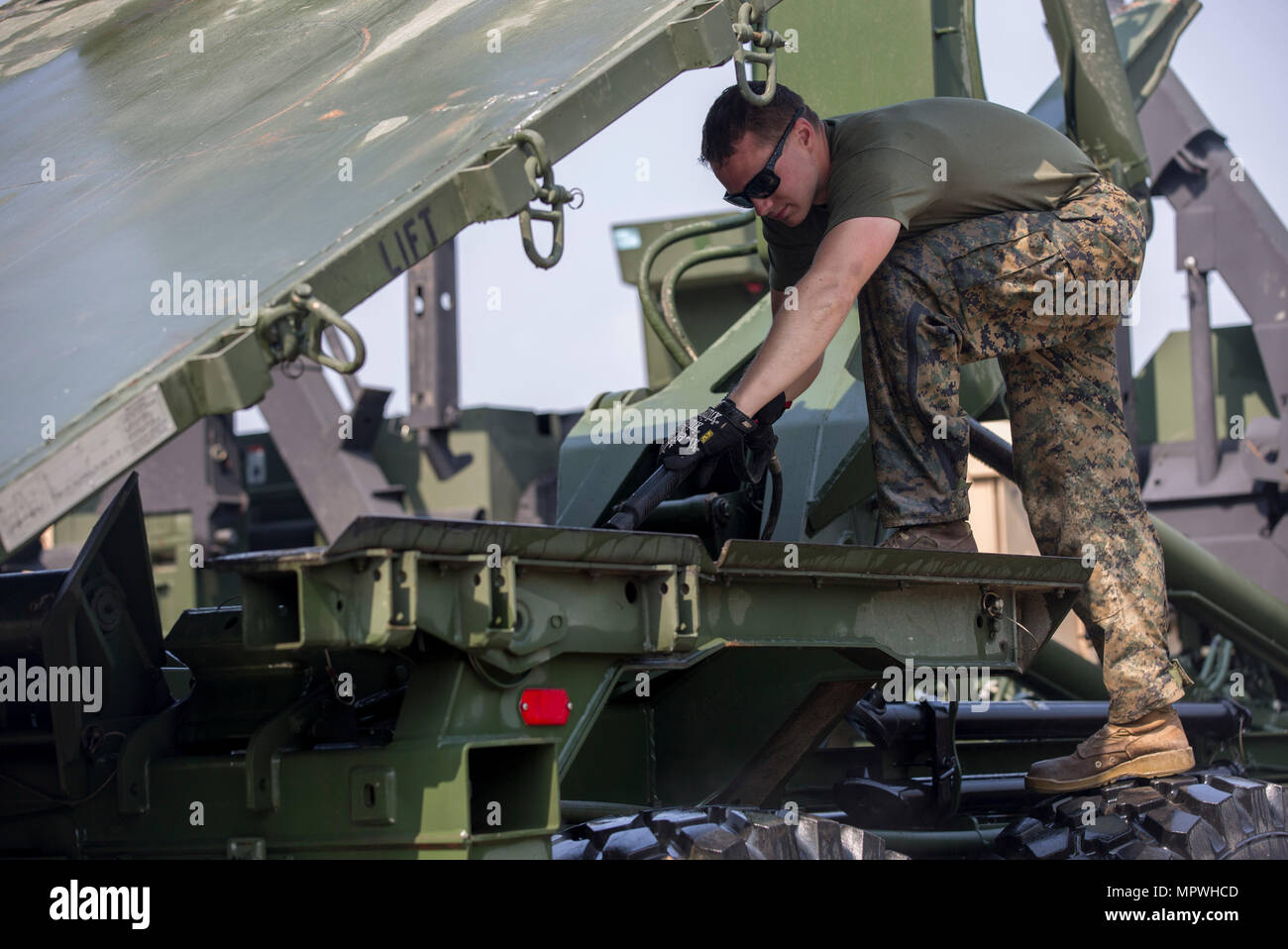 A U.S. Marine with Combat Logistics Regiment 35, 3D Marine Logistics ...
