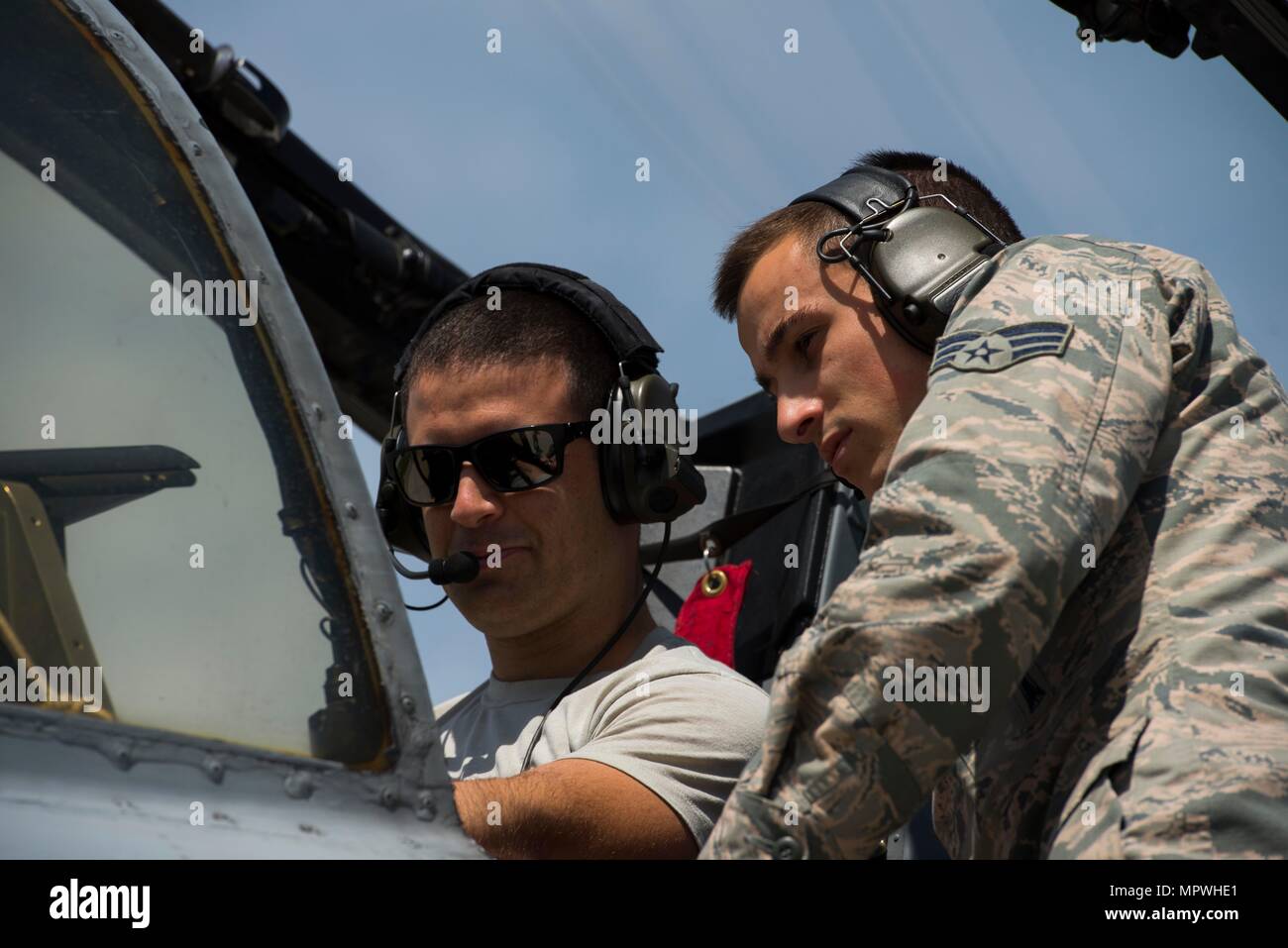 U.S. Air Force Staff Sgt. Wesley Gasper (left), and Senior Airman ...