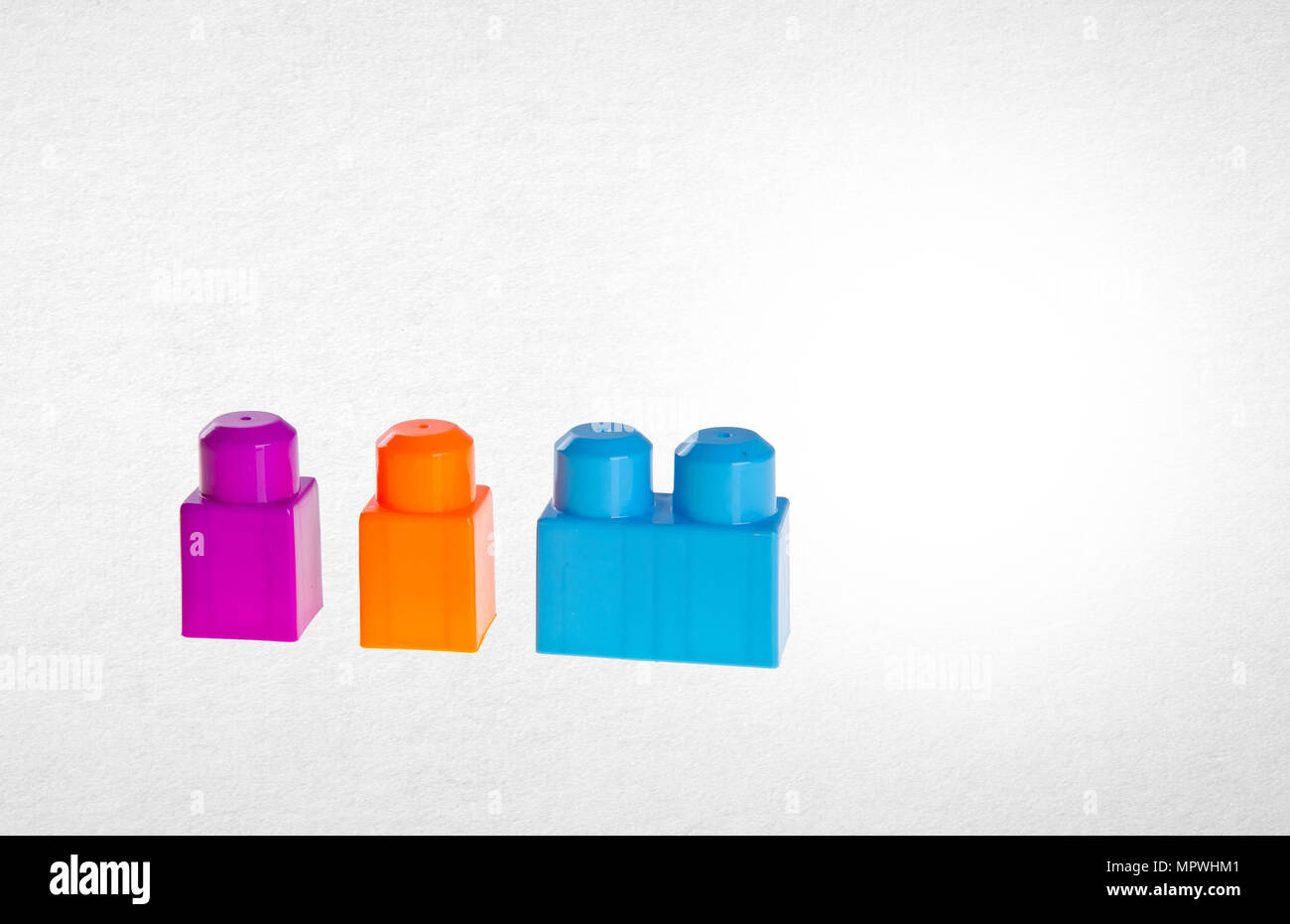 Plastic building blocks or colour blocks on a background Stock Photo ...