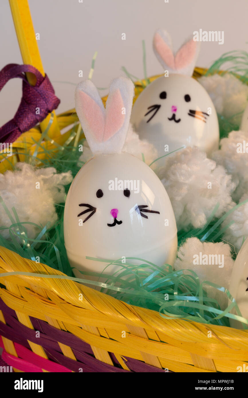 Easter bunny in basket hi-res stock photography and images - Alamy