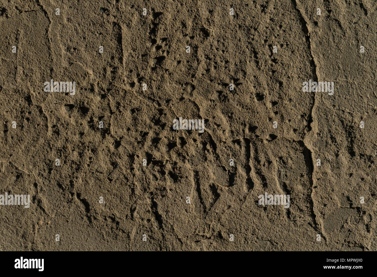 background, texture - brown clay wall with bumps and cracks Stock Photo ...