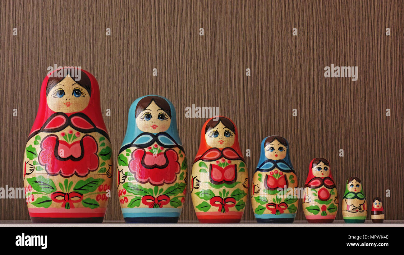 colorful dolls of a matrioshka lined up in order of size Stock Photo ...