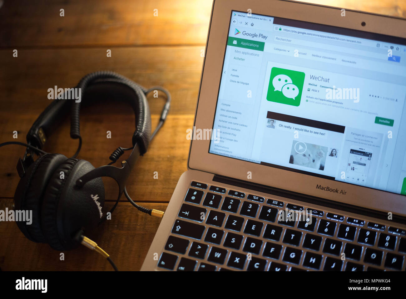 The WeChat application seen displayed on a Apple MacBook Air computer ...