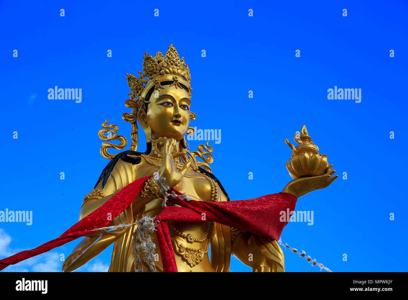 Golden statue of Buddhist female god on the Buddha Dordenma temple ...
