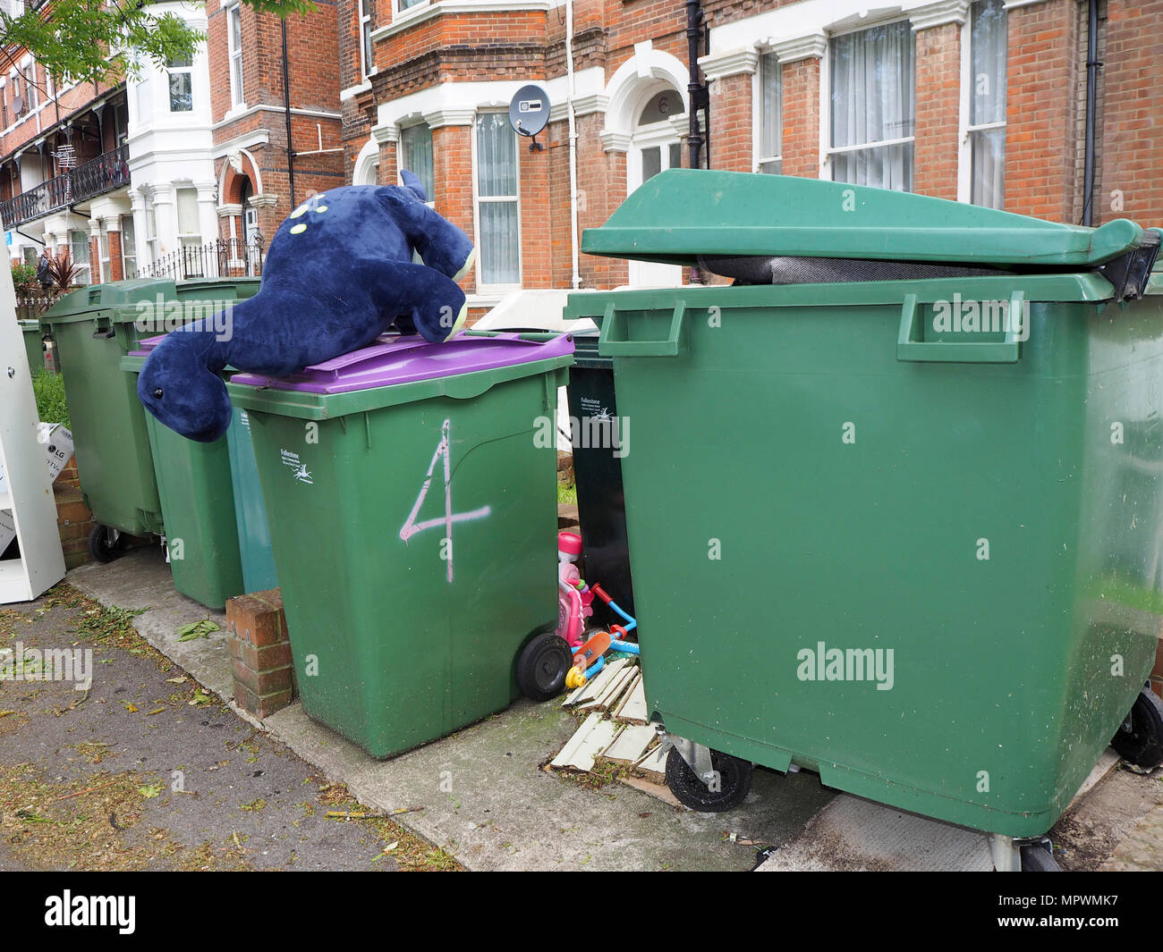 Green wheelie bins Stock Photo - Alamy
