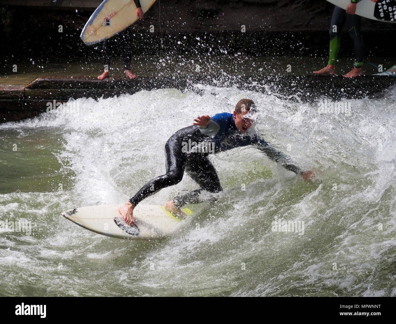 Surfing on Eisbach in Munich, Germany Stock Photo - Alamy