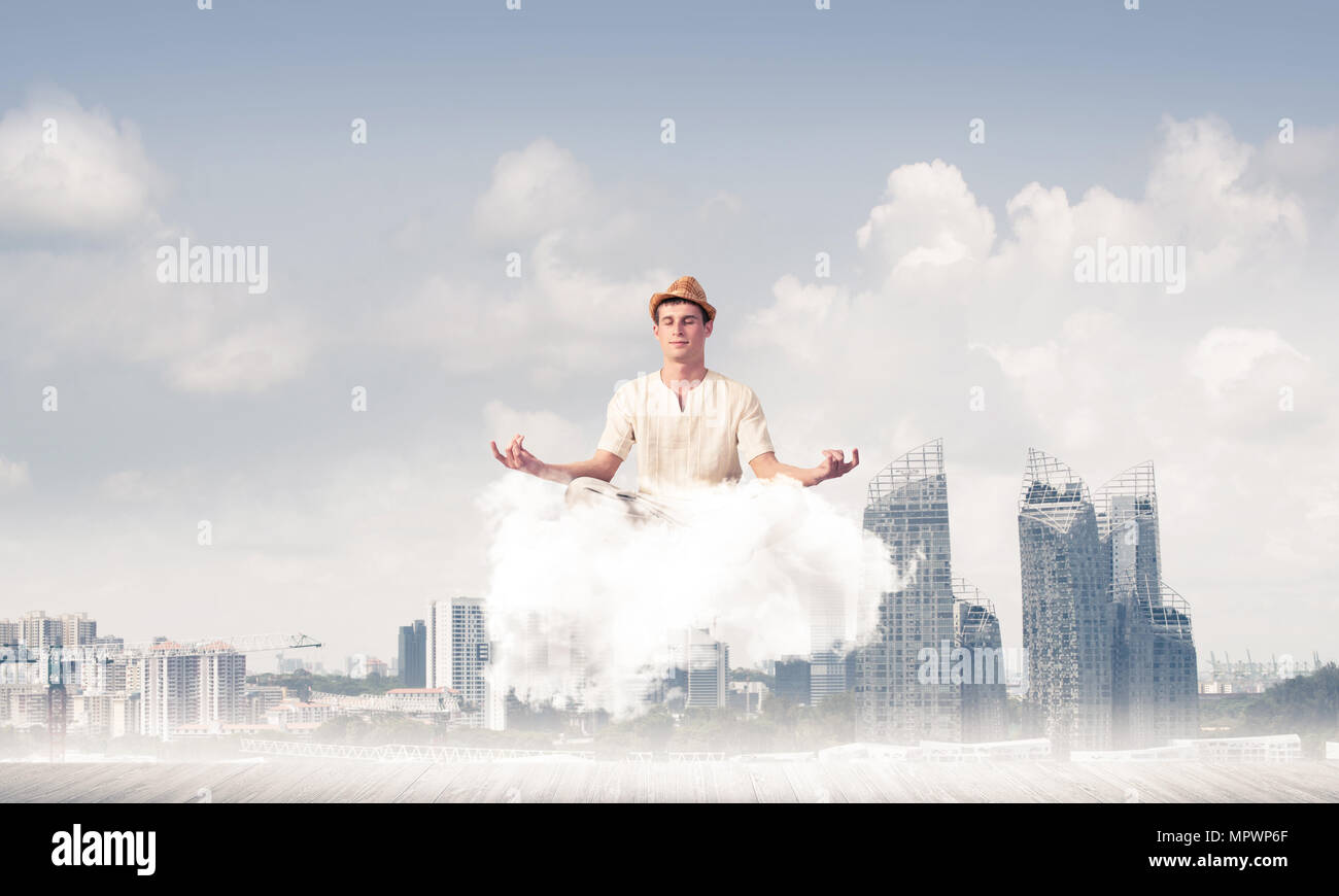 Young man keeping mind conscious Stock Photo - Alamy