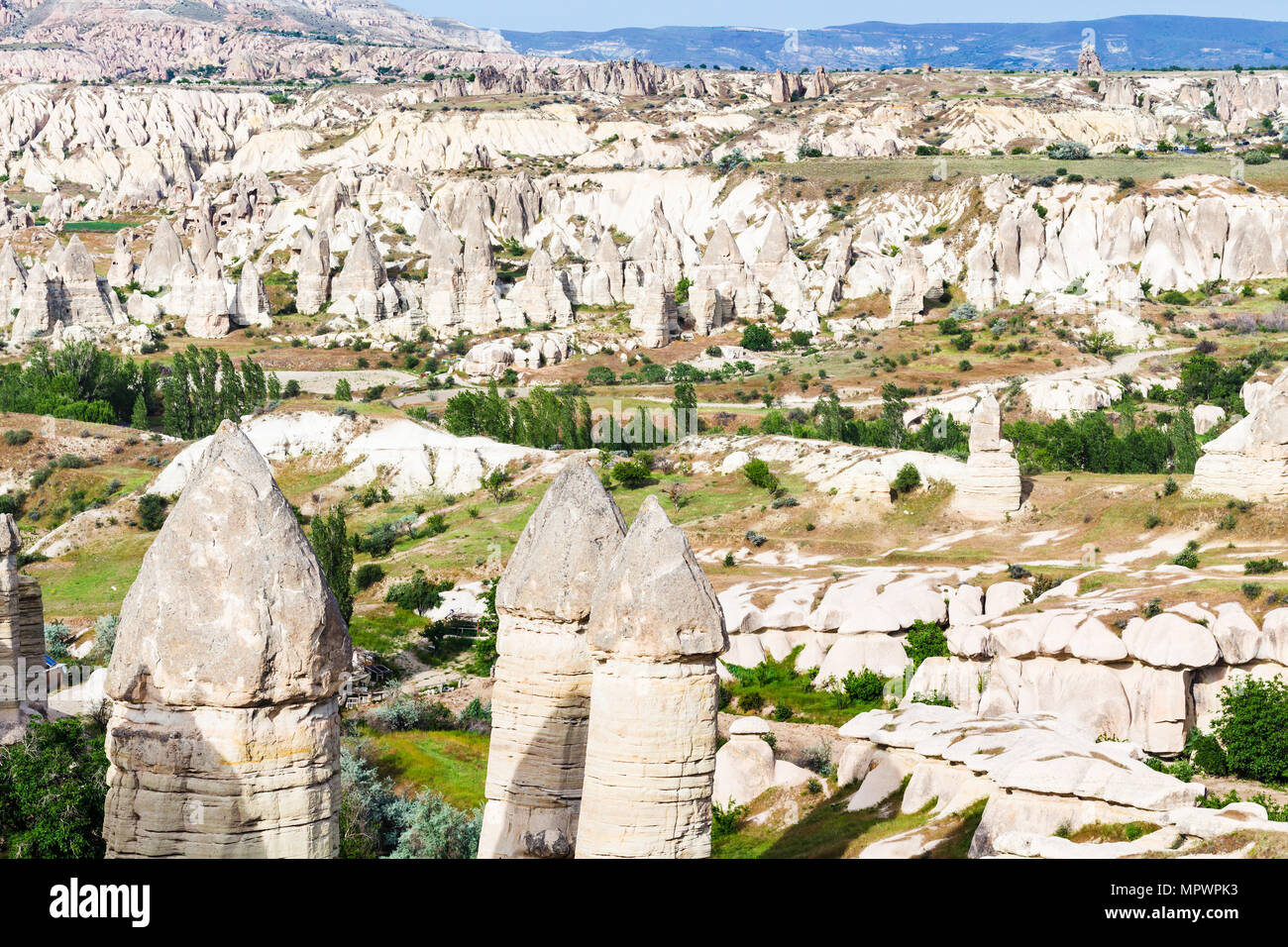 Travel to Turkey - above view of fairy chimney rocks in mountain valley ...