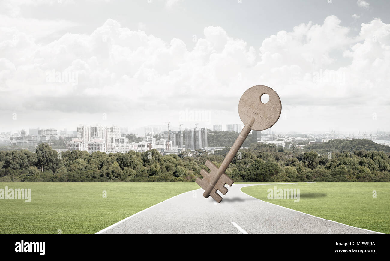 Conceptual background image of concrete key sign on asphalt road Stock ...