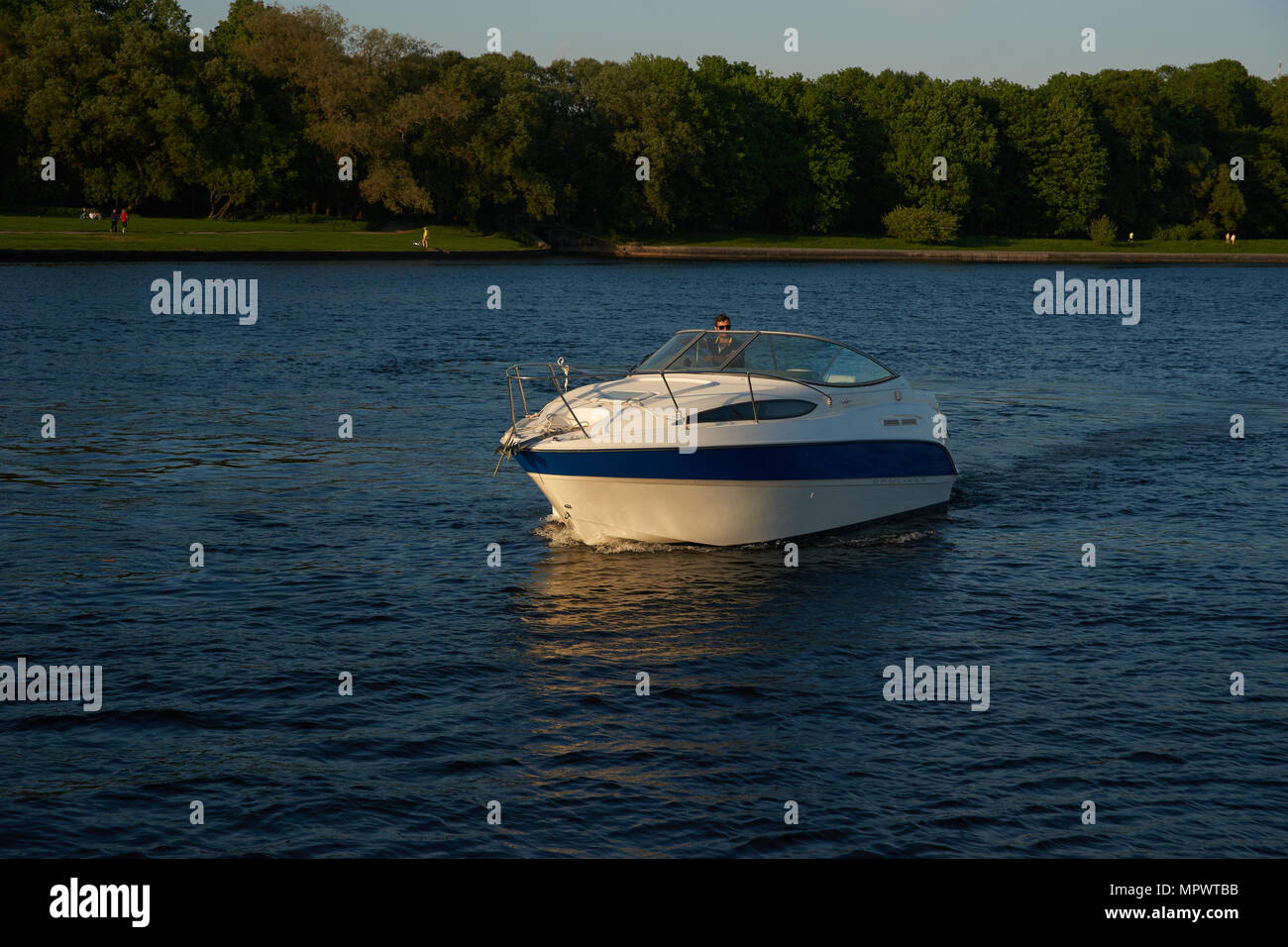 Motor boat on water Stock Photo - Alamy