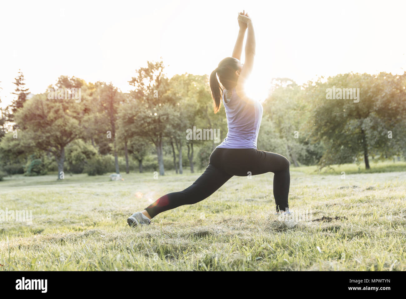 Stretch sunrise arms hi-res stock photography and images - Alamy