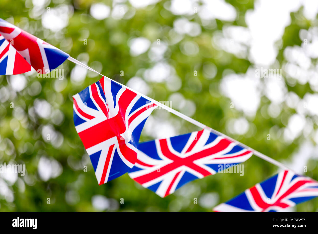 Union Jack bunting flapping in the breeze celebrating British event ...