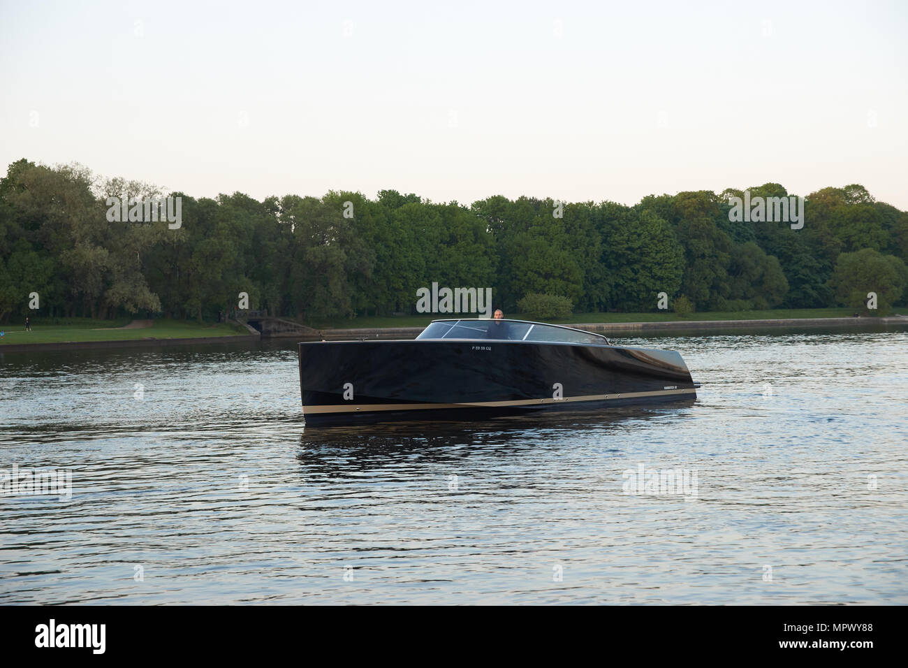 Motor boat on water Stock Photo - Alamy