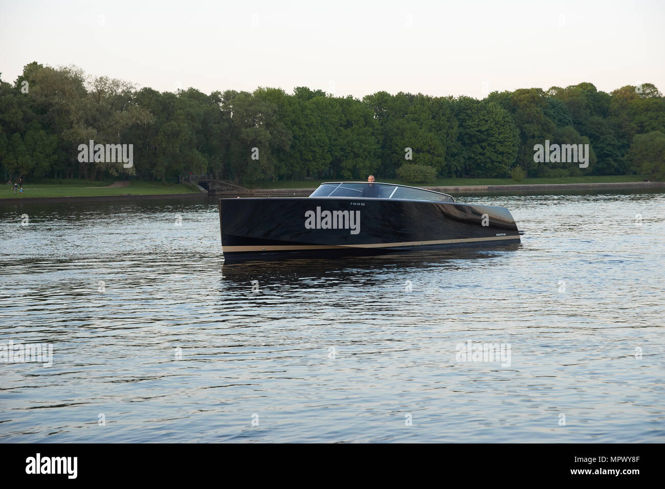 Motor boat on water Stock Photo - Alamy