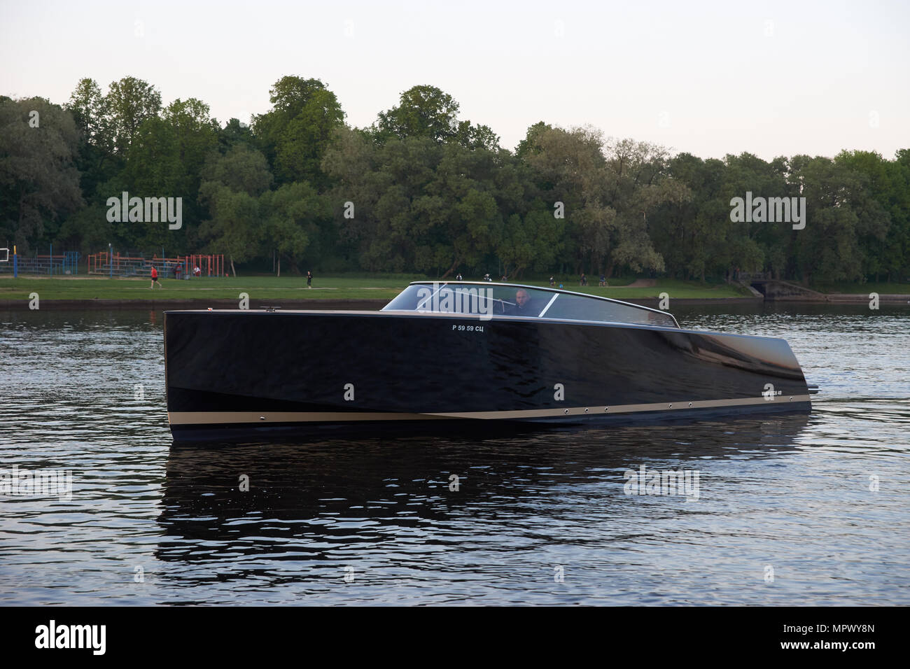 Motor boat on water Stock Photo - Alamy