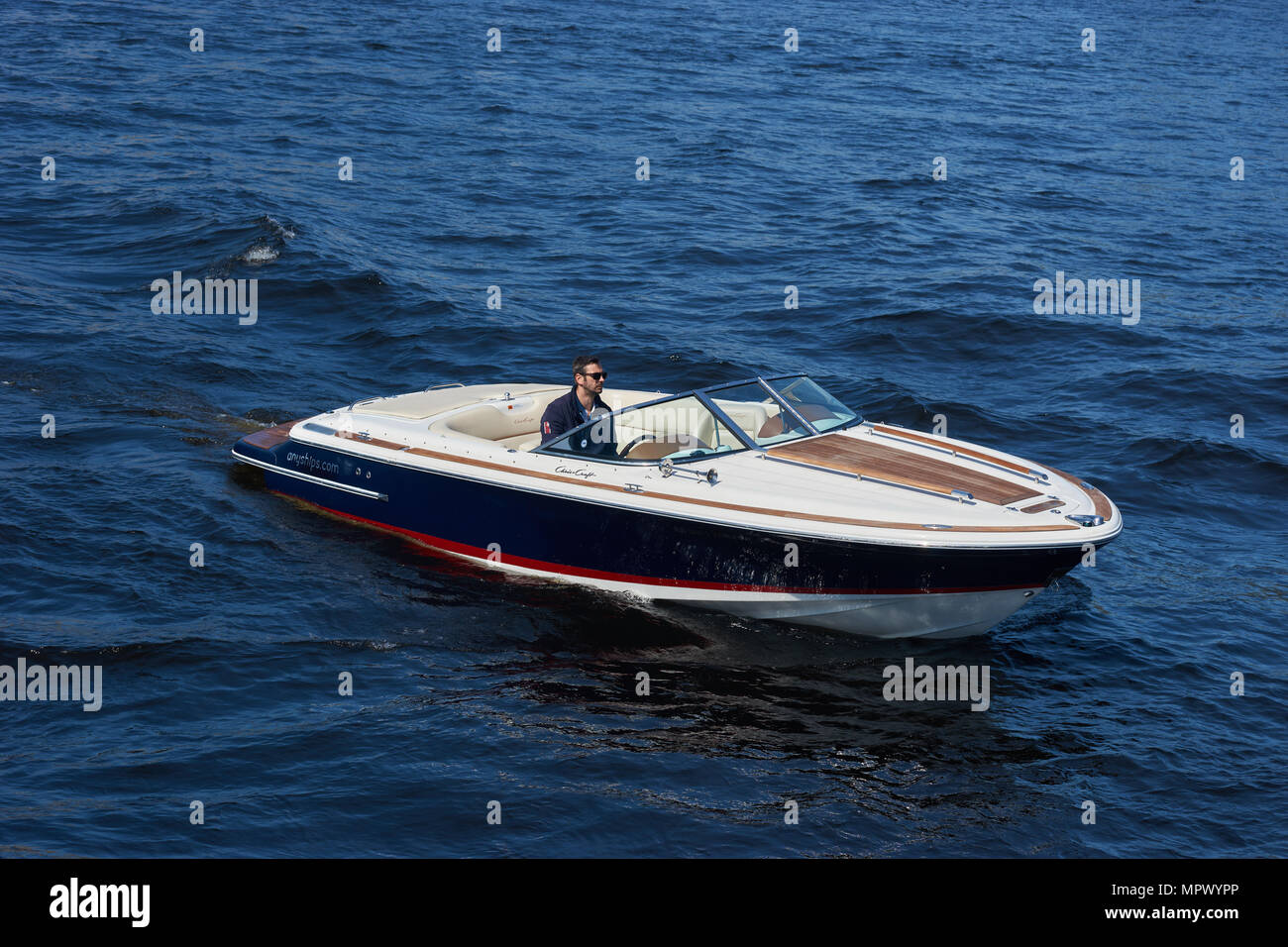 Motor boat on water Stock Photo - Alamy