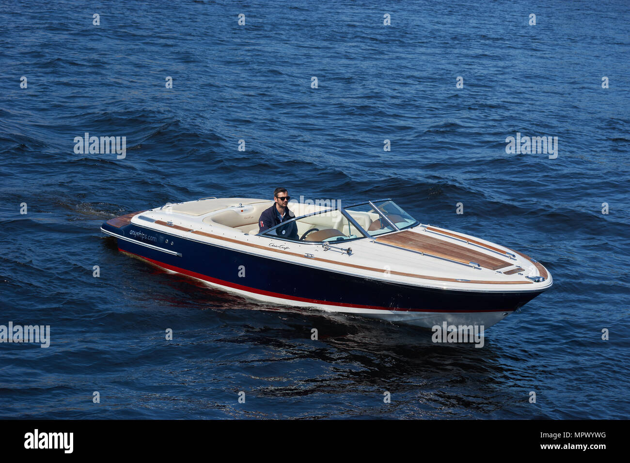 Motor boat on water Stock Photo - Alamy