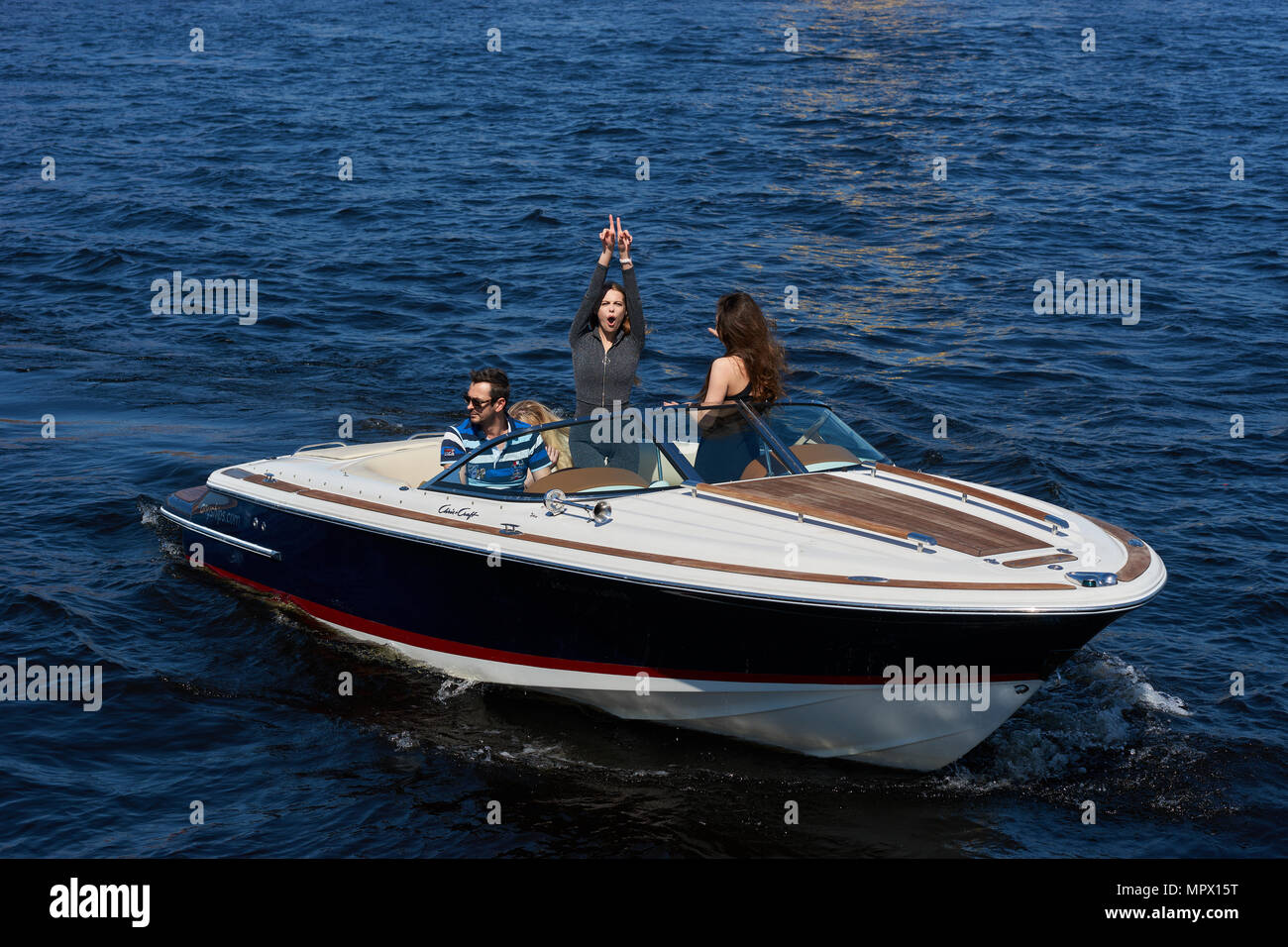 Motor boat on water Stock Photo - Alamy