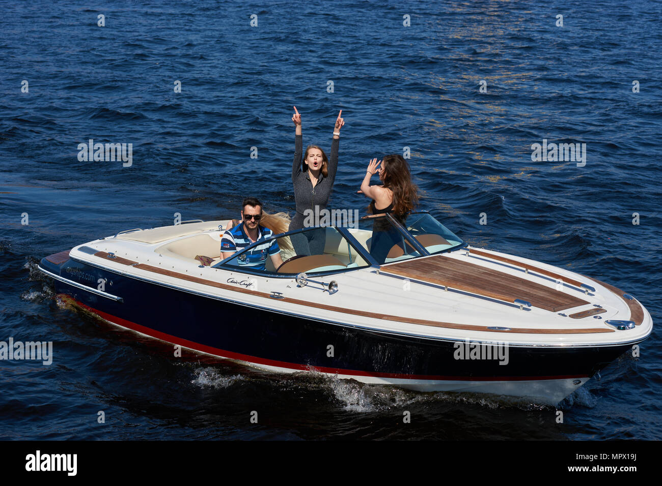 Motor boat on water Stock Photo - Alamy