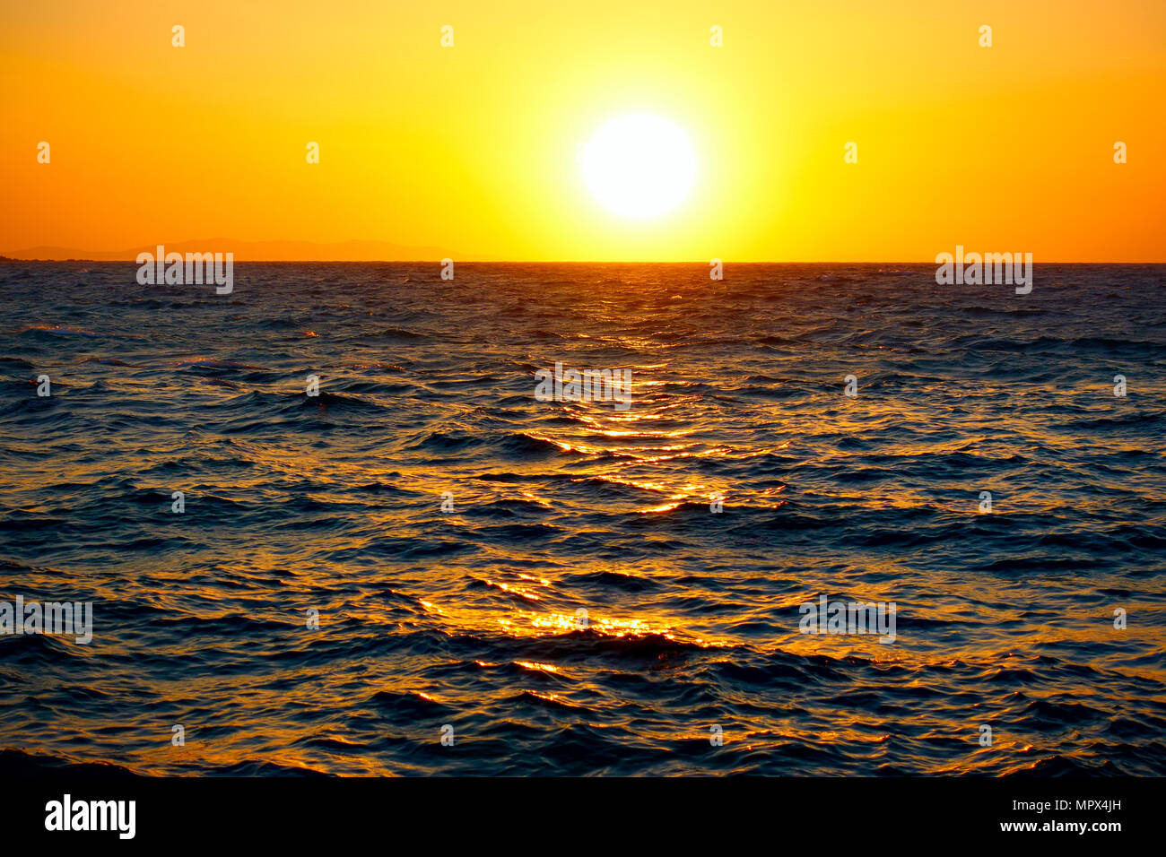 Scenic sundown over sea - Sunset seascape Stock Photo - Alamy