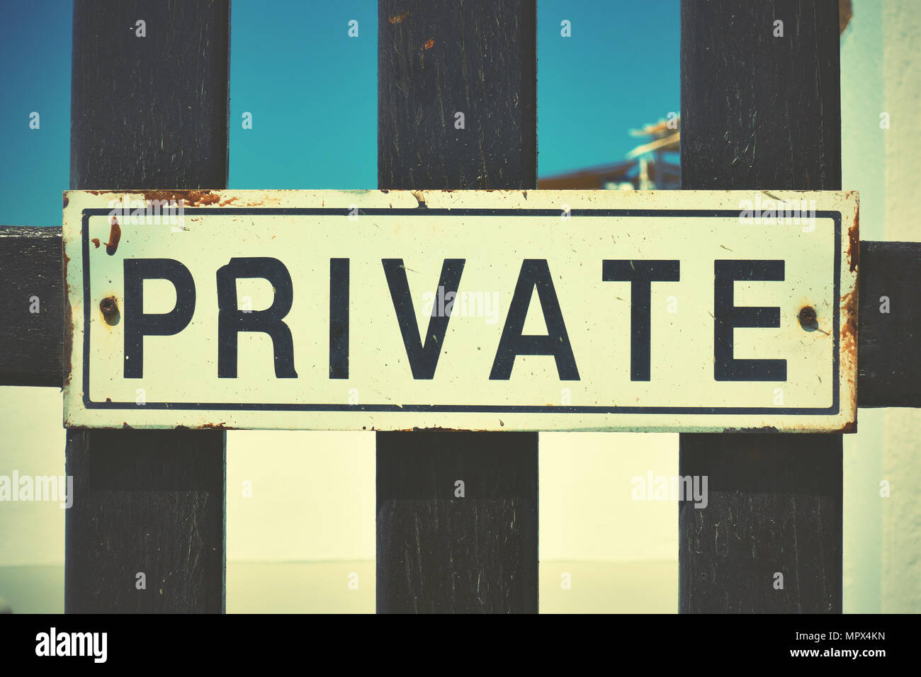 Private sign on a gate close-up. Vintage style Stock Photo - Alamy