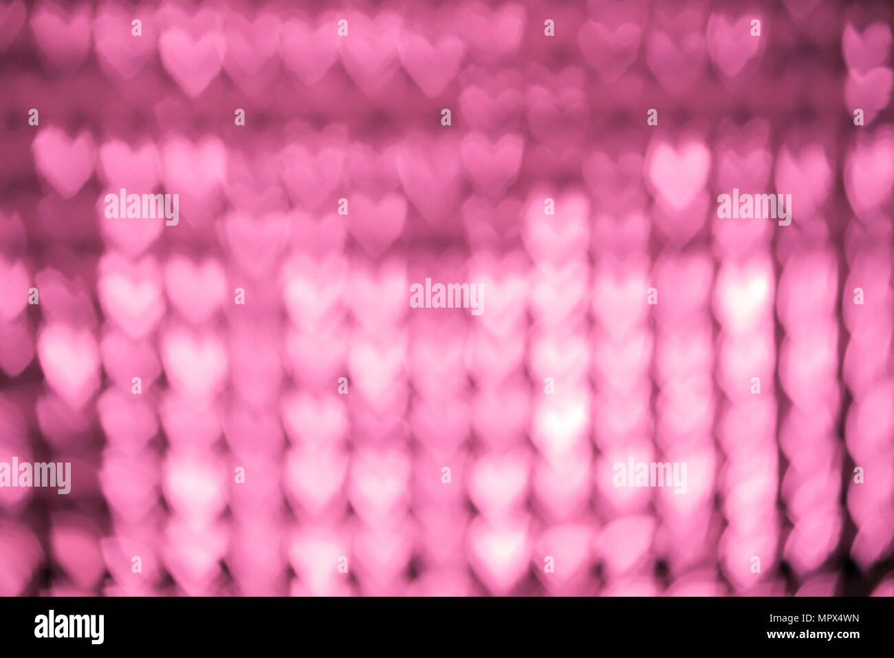 Abstract blur background with heart shaped. Pink tone Stock Photo - Alamy
