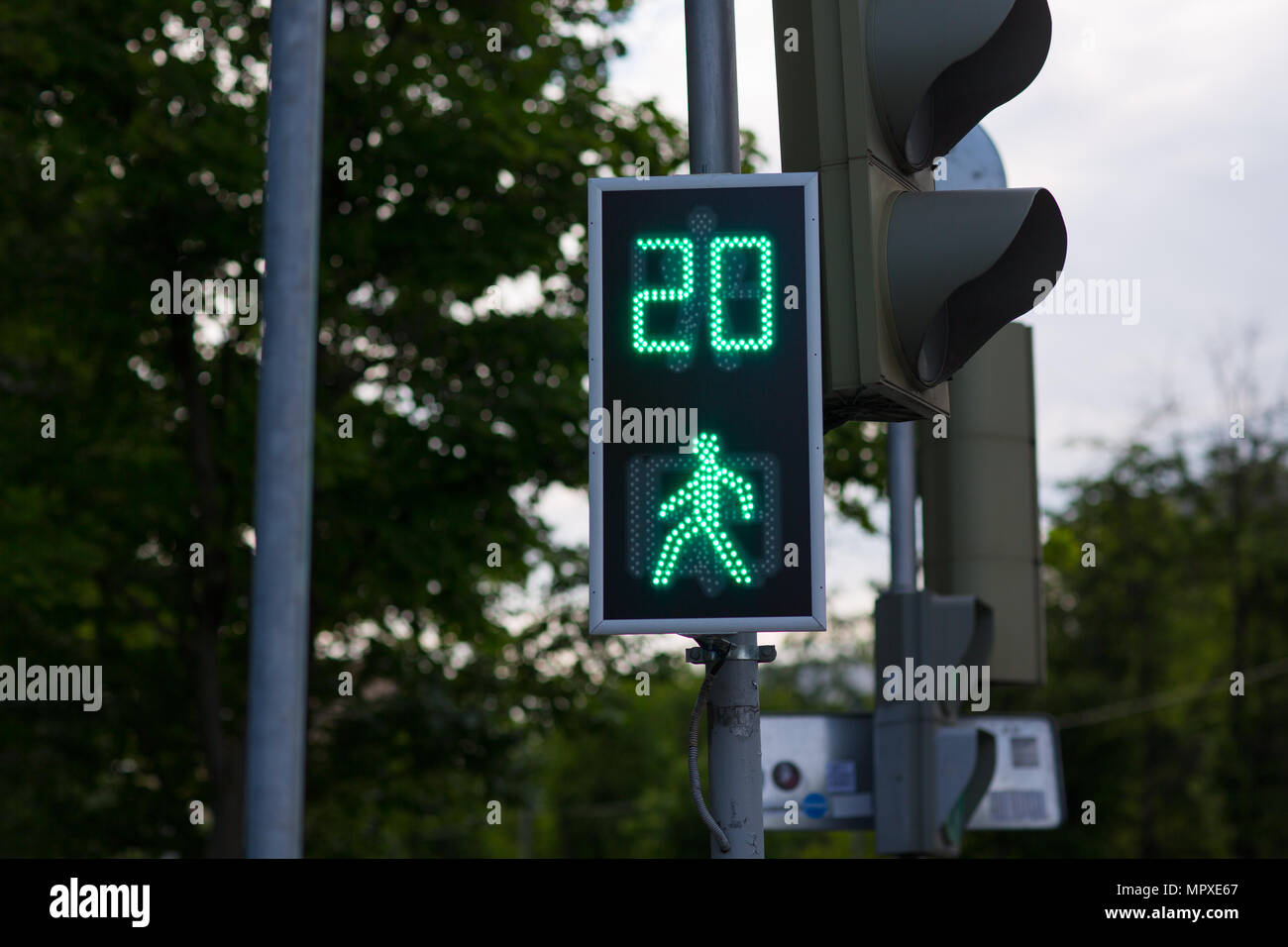 Green traffic light pedestrian timer Stock Photo - Alamy