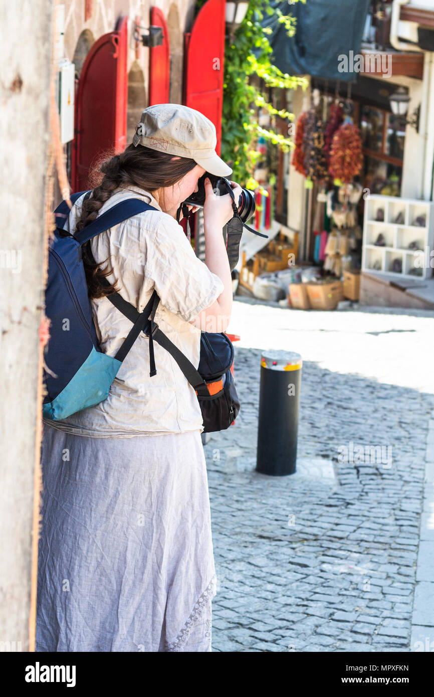 Travel to Turkey - tourist takes a photo on street in Cankaya district ...
