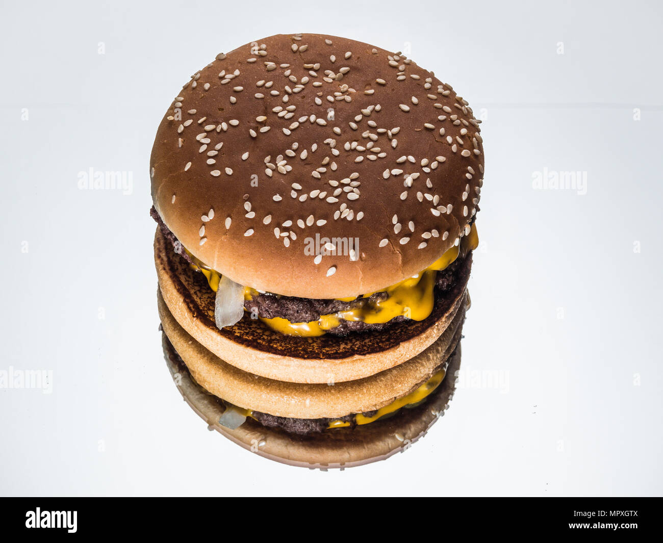 double pattie hamburger on mirror Stock Photo - Alamy