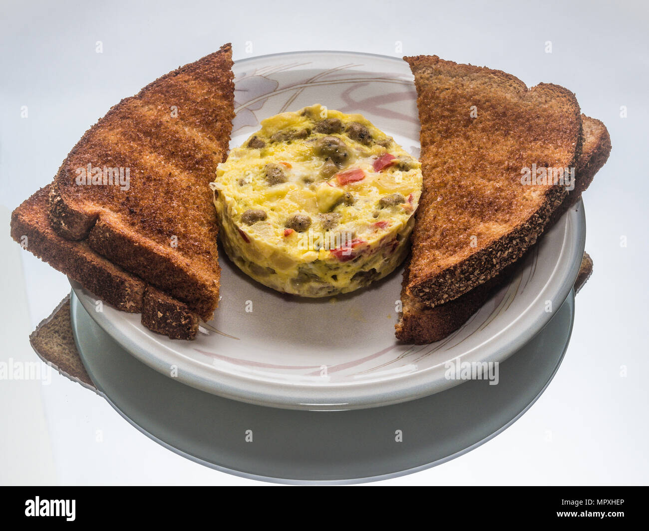 scrambled eggs and wheat toast breakfast on mirror Stock Photo - Alamy