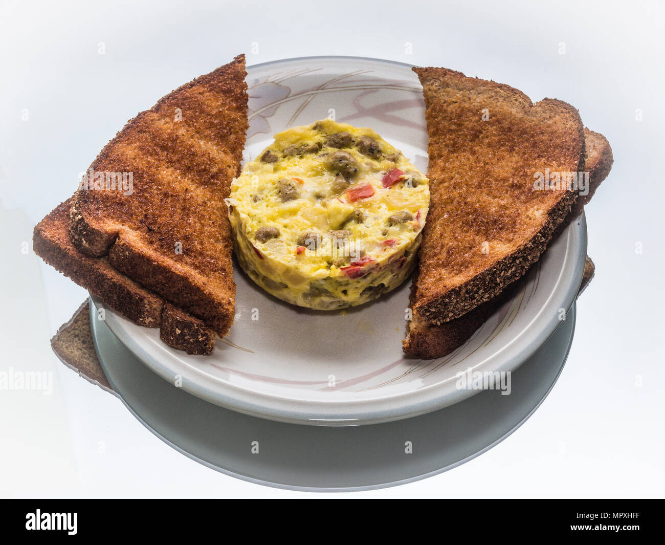 scrambled eggs and wheat toast breakfast on mirror Stock Photo - Alamy