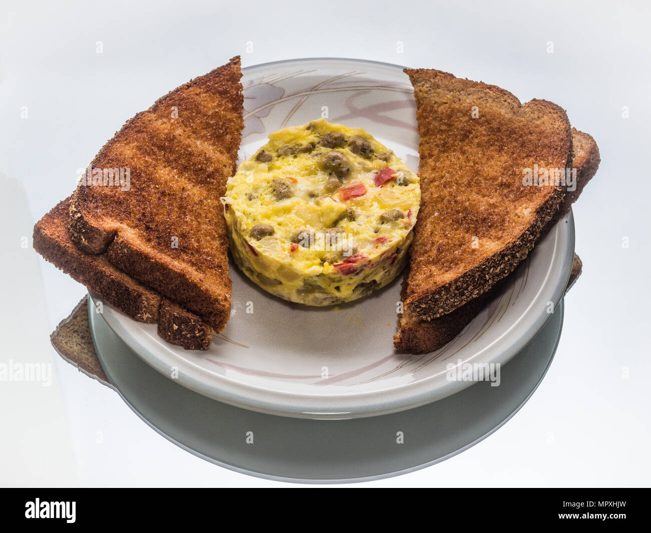 scrambled eggs and wheat toast breakfast on mirror Stock Photo - Alamy